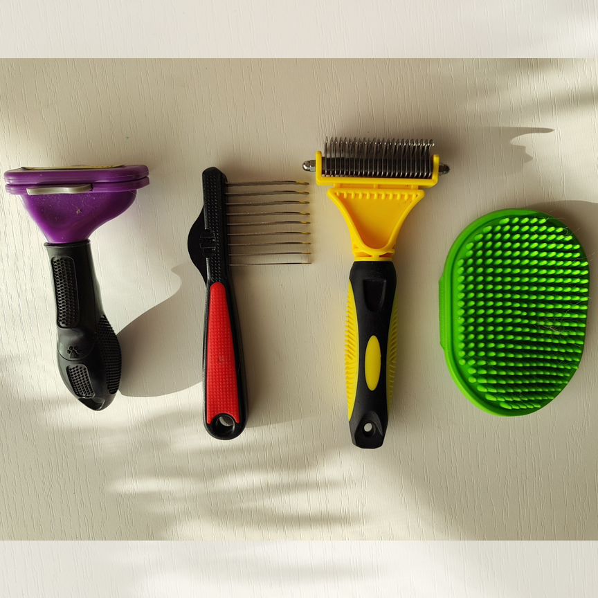 Расчески и пуходерки для кошек и собак