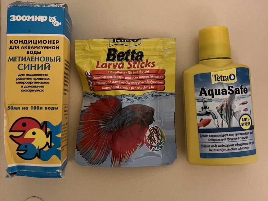 Корм для петушка и кондиционер для воды