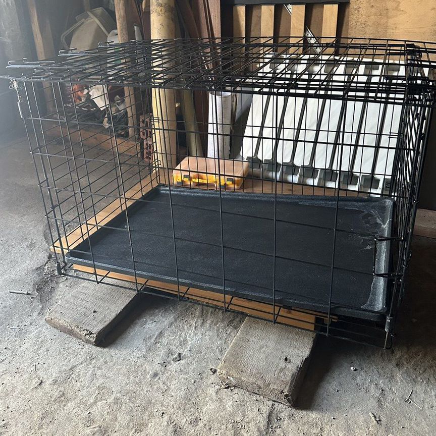 Продам клетку для средней собаки
